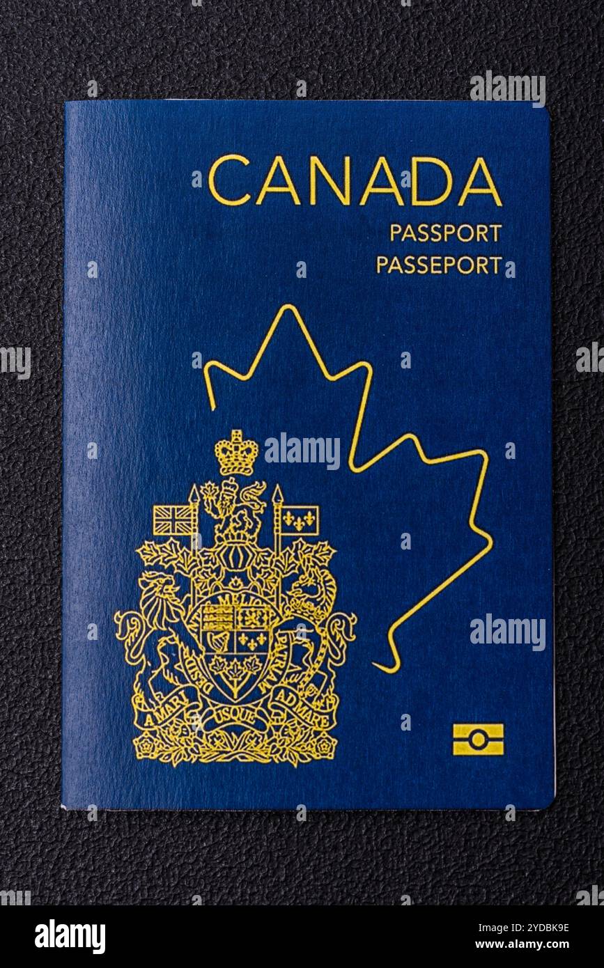 Physical paper international passport of a Canadian citizen Stock Photo ...
