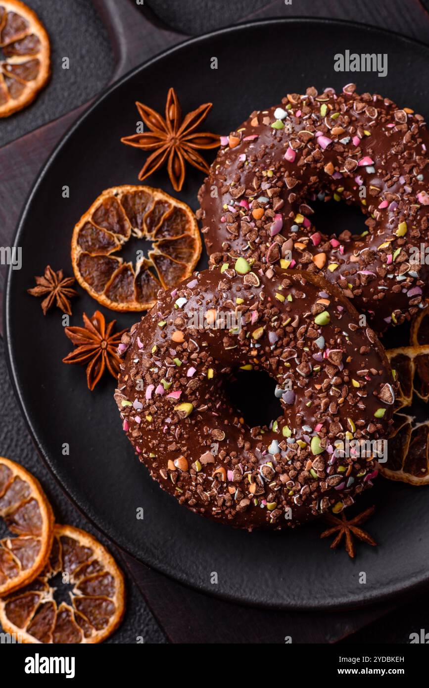 Delicious fresh donuts with filling and chocolate coating Stock Photo ...