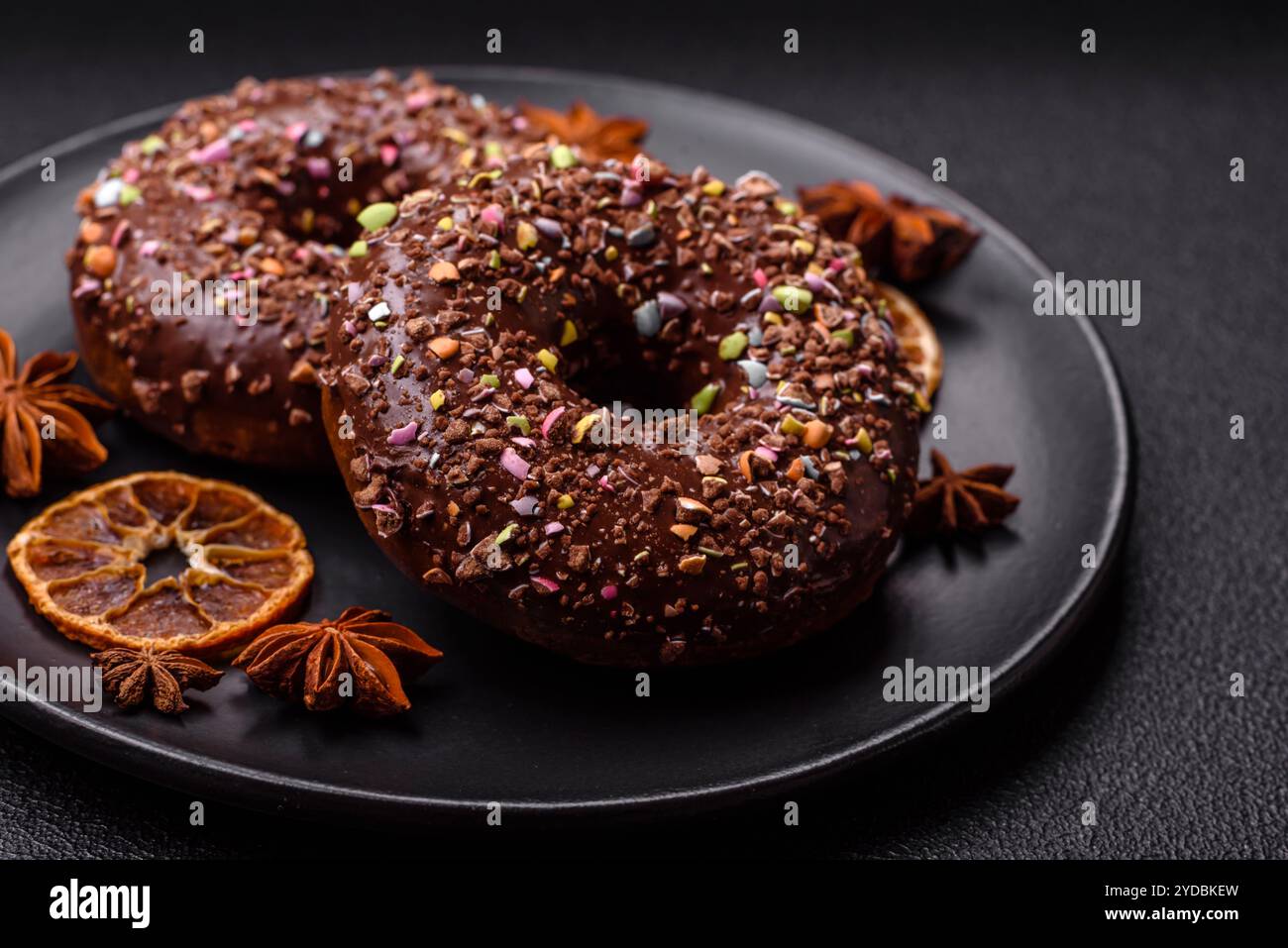 Delicious fresh donuts with filling and chocolate coating Stock Photo ...