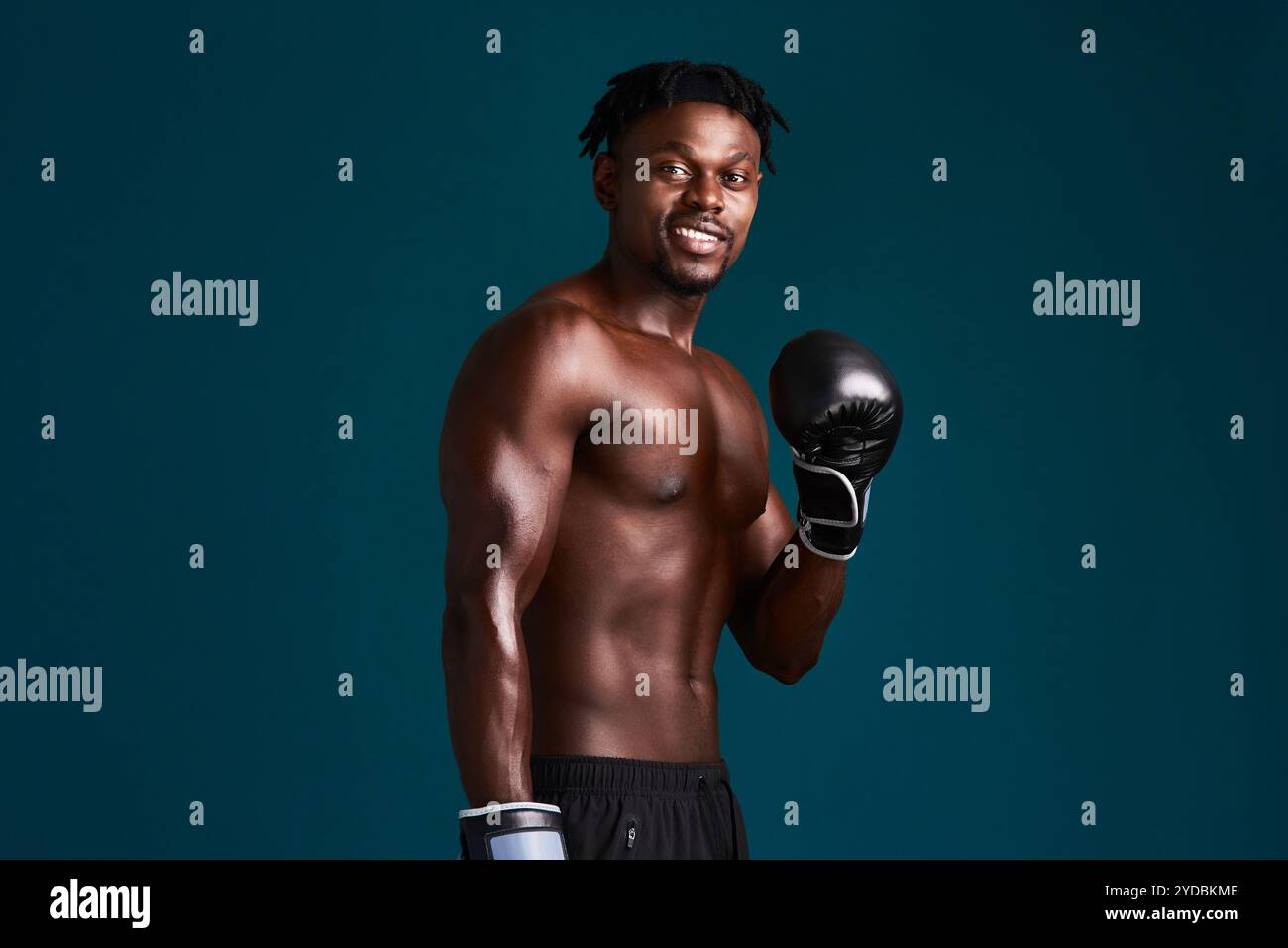 Studio, black man and portrait with fist for gloves, mma workout and ...