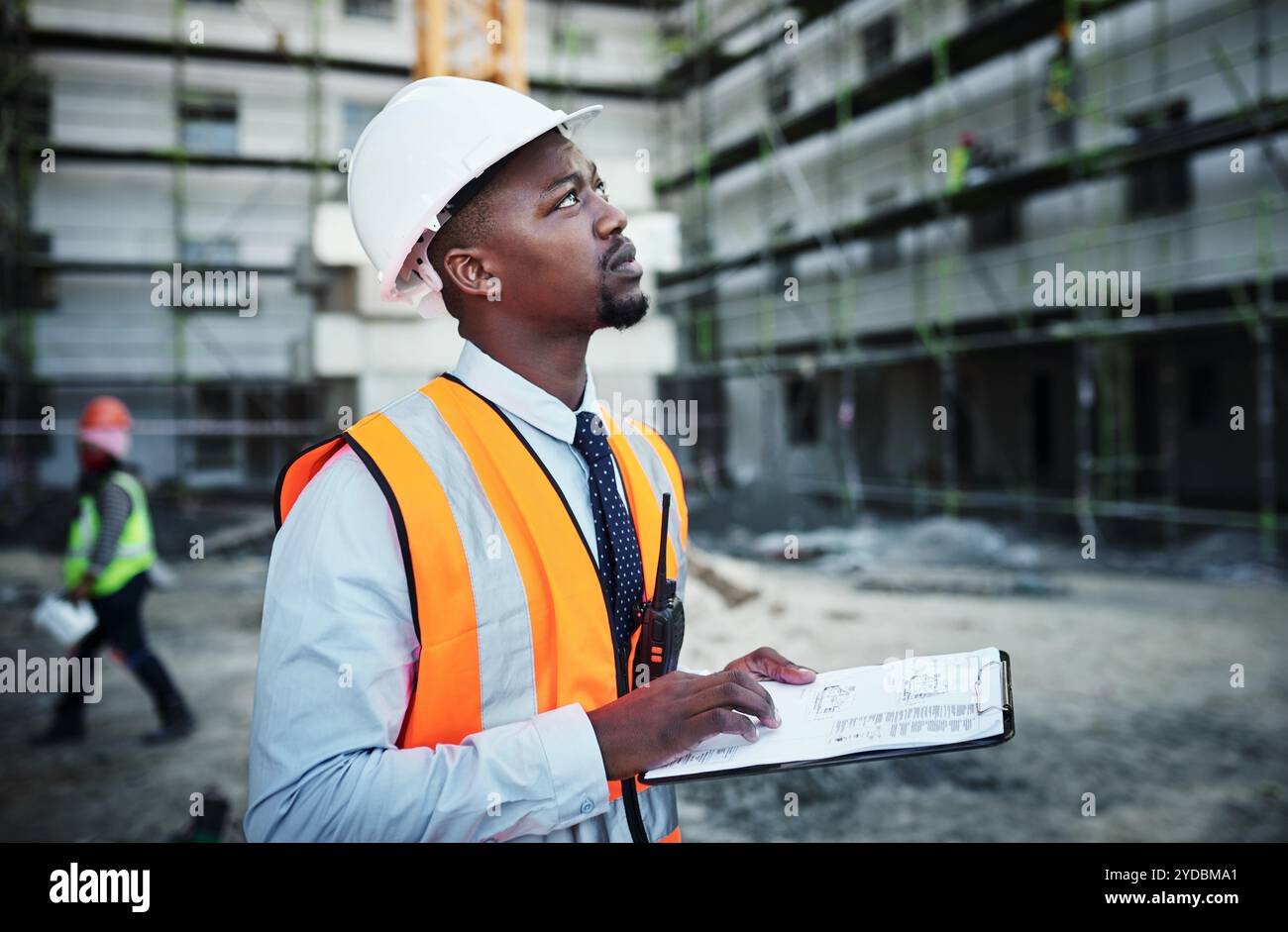 Black man, civil engineer and inspector with clipboard for construction ...
