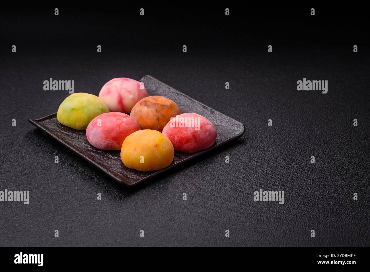 Delicious colorful asian mochi sweets with rice dough shell Stock Photo ...