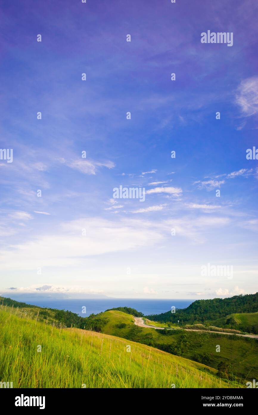 Landscape with mountains and blue sky. Portrait. Cabaliwan Peak ...
