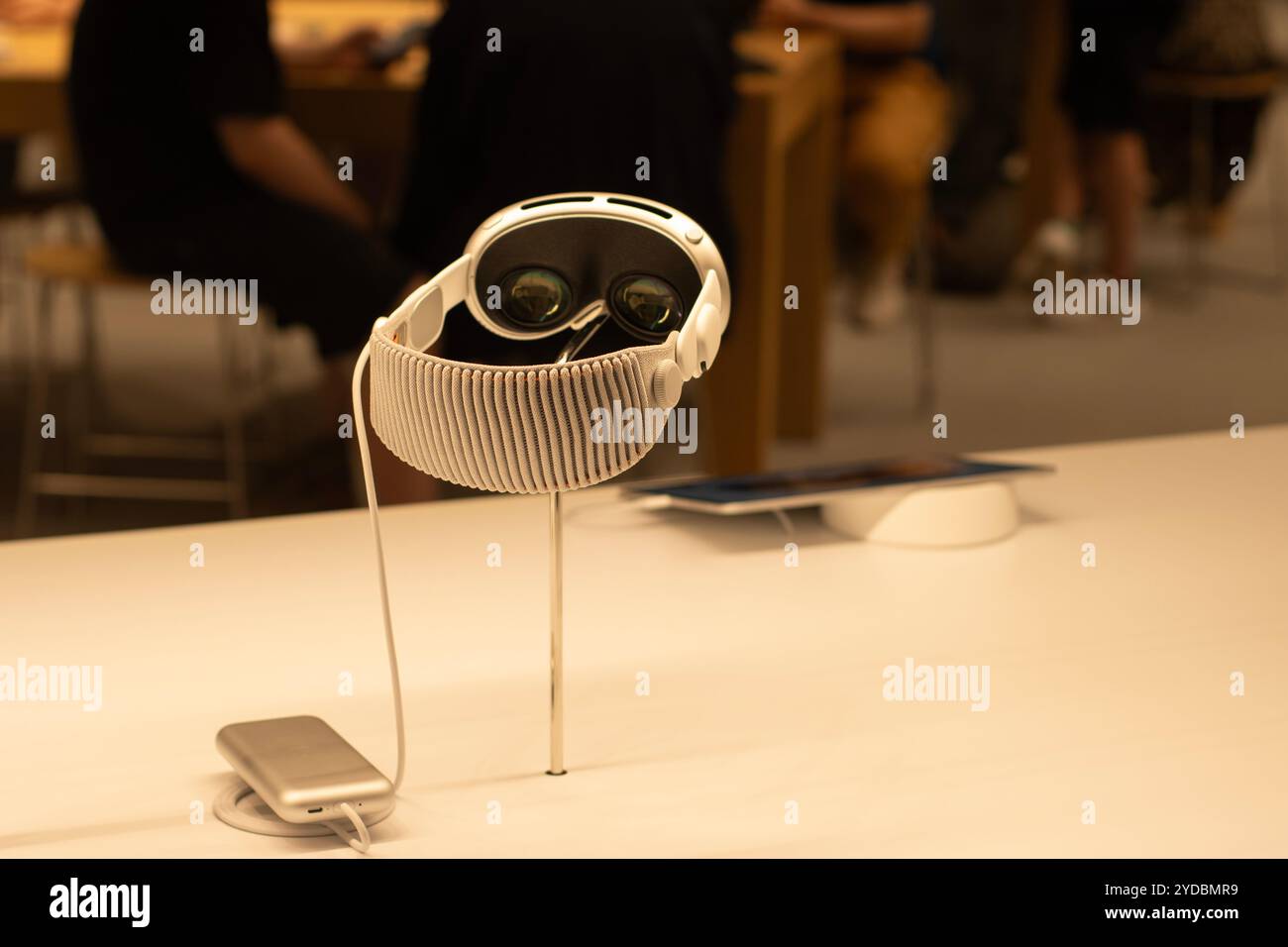 Closeup of the Apple Vision Pro with its external rechargeable battery ...