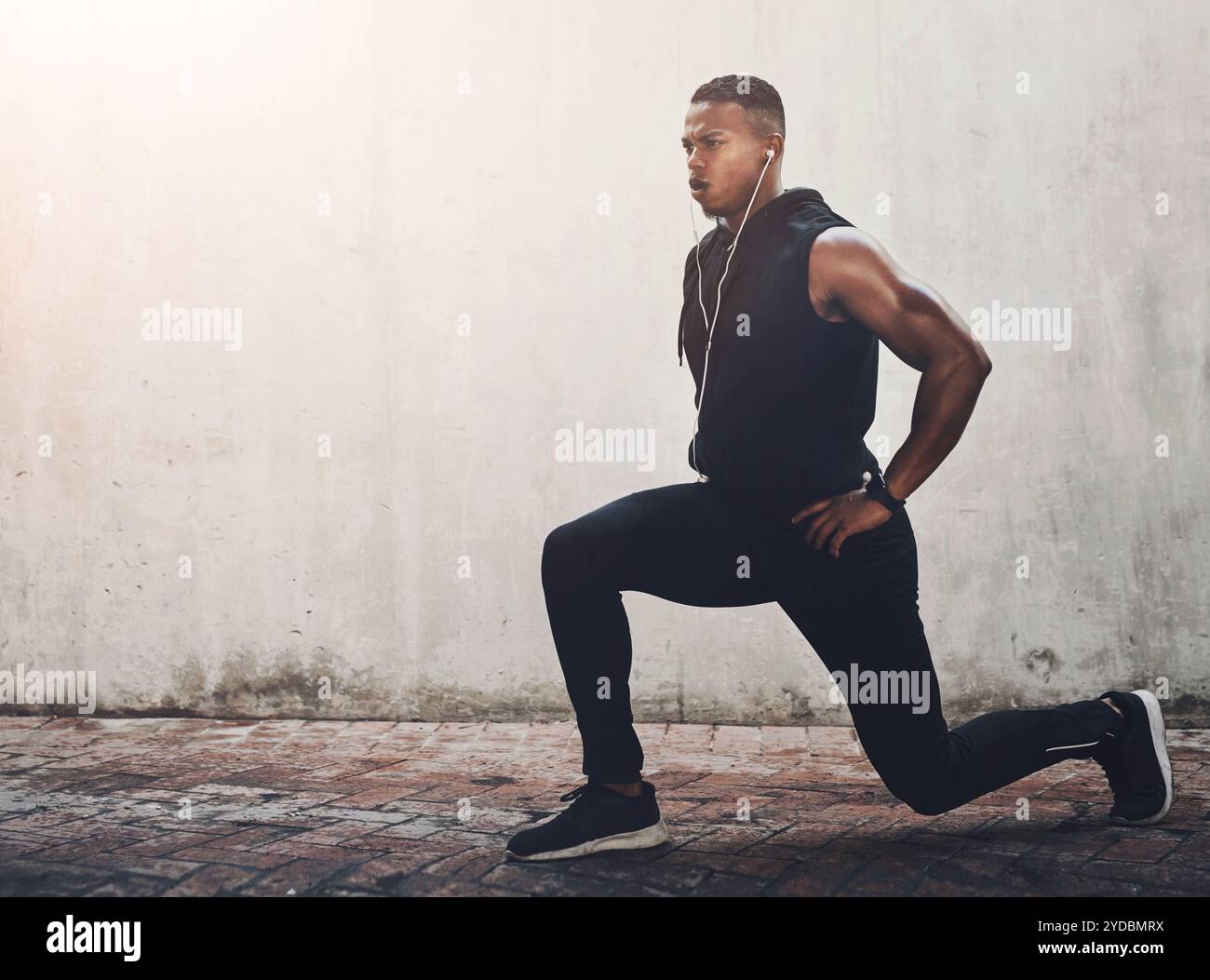 Man, exercise and lunge with earphones in city for strong muscle ...