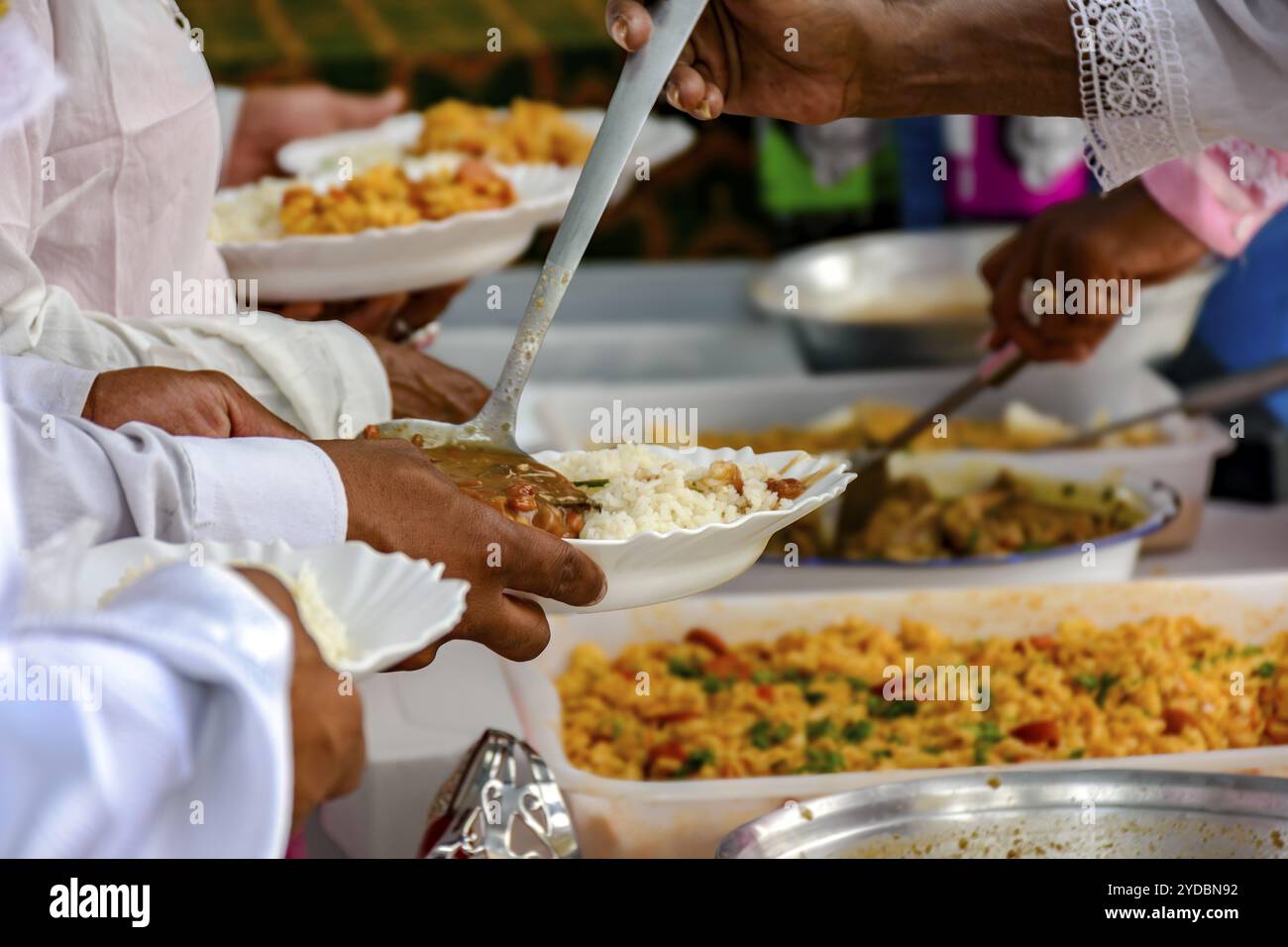 Traditional Brazilian food being served in a popular restaurant for the ...