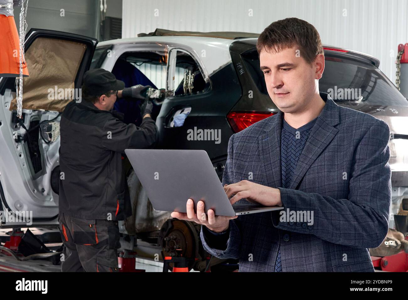 Standing examining holding uniform hi-res stock photography and images ...