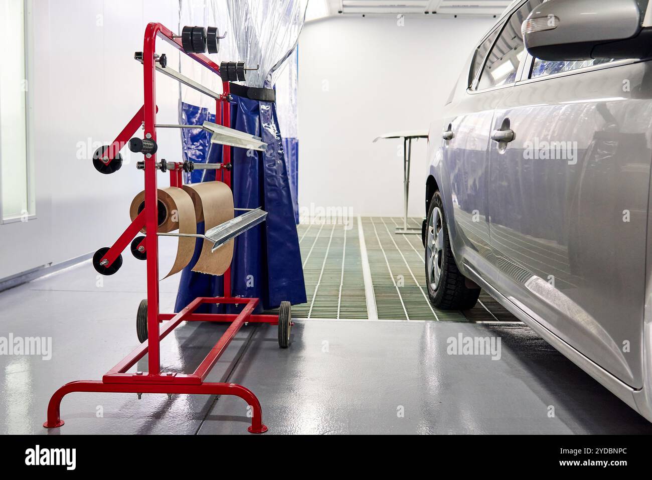 Car in painting booth in repair auto service shop, ready to be painted ...