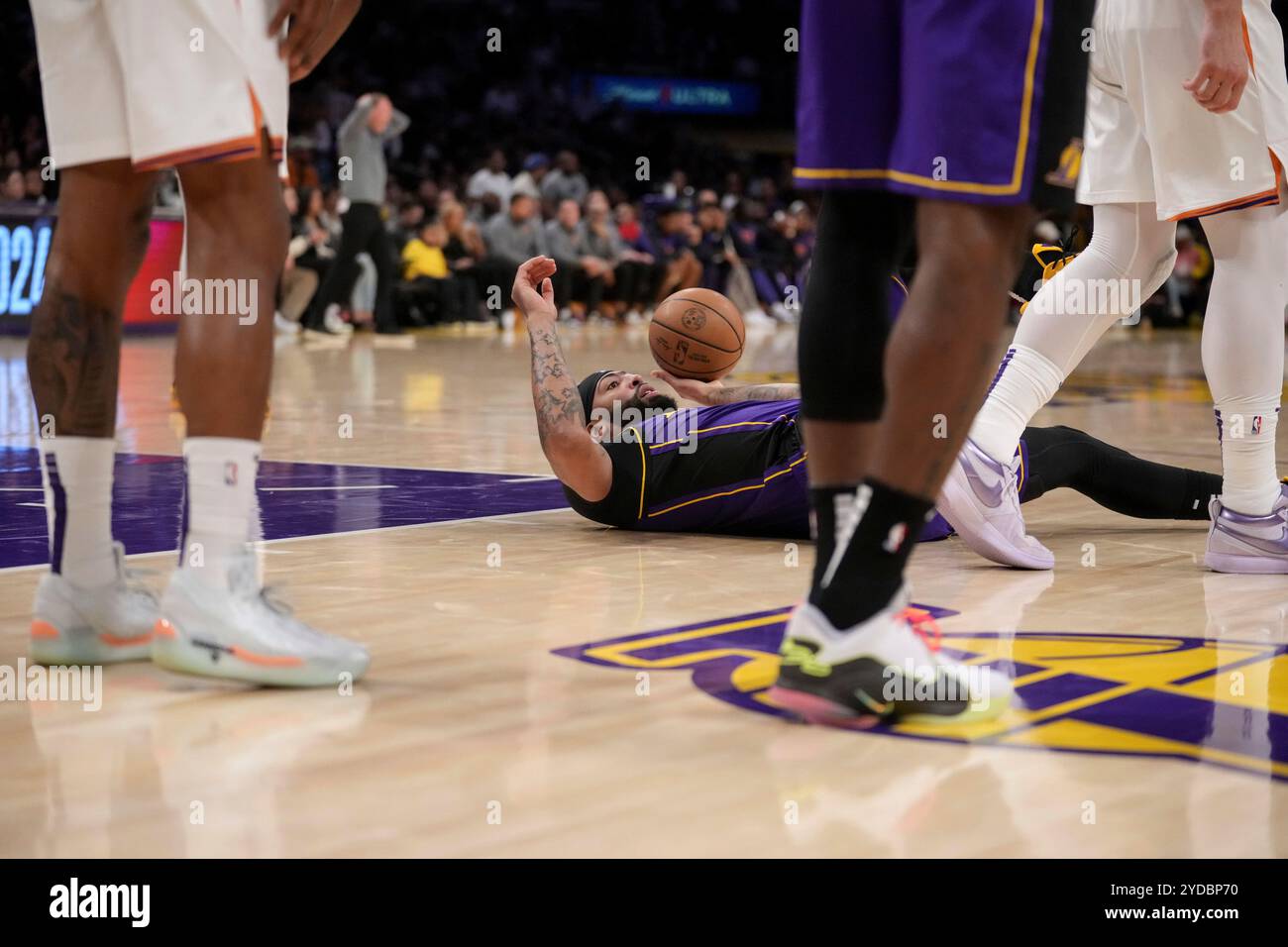 Los Angeles Lakers forward Anthony Davis falls to the ground during the ...