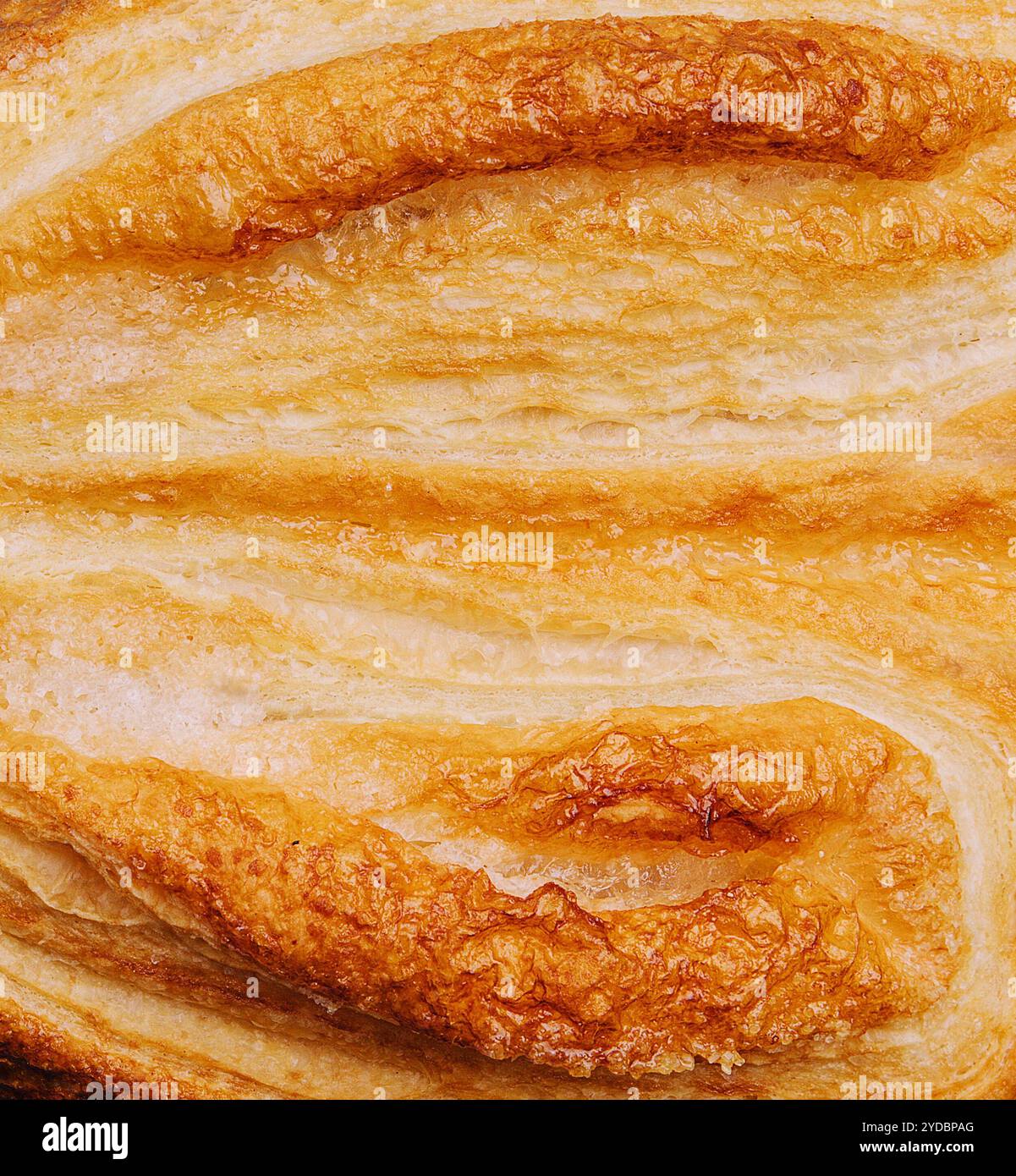 Puff pastry cookies close up background Stock Photo - Alamy