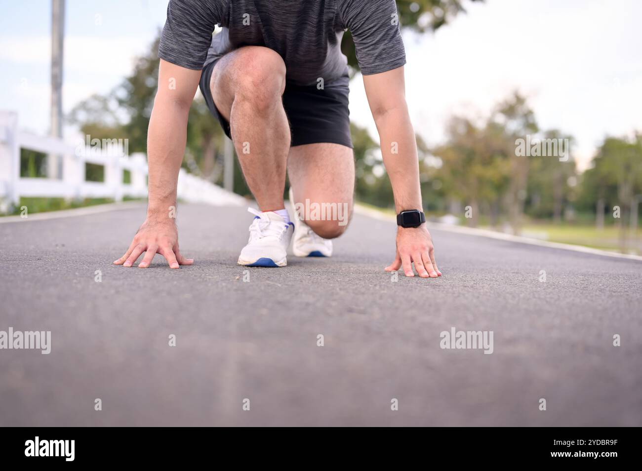 Athlete man in starting position ready for sprint. Goals and motivation ...