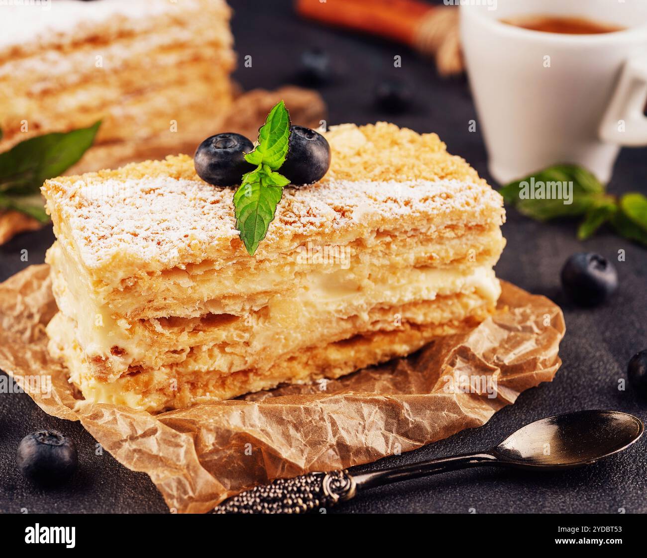 baked cake Napoleon, Millefeuille garnished with blueberry and mint ...