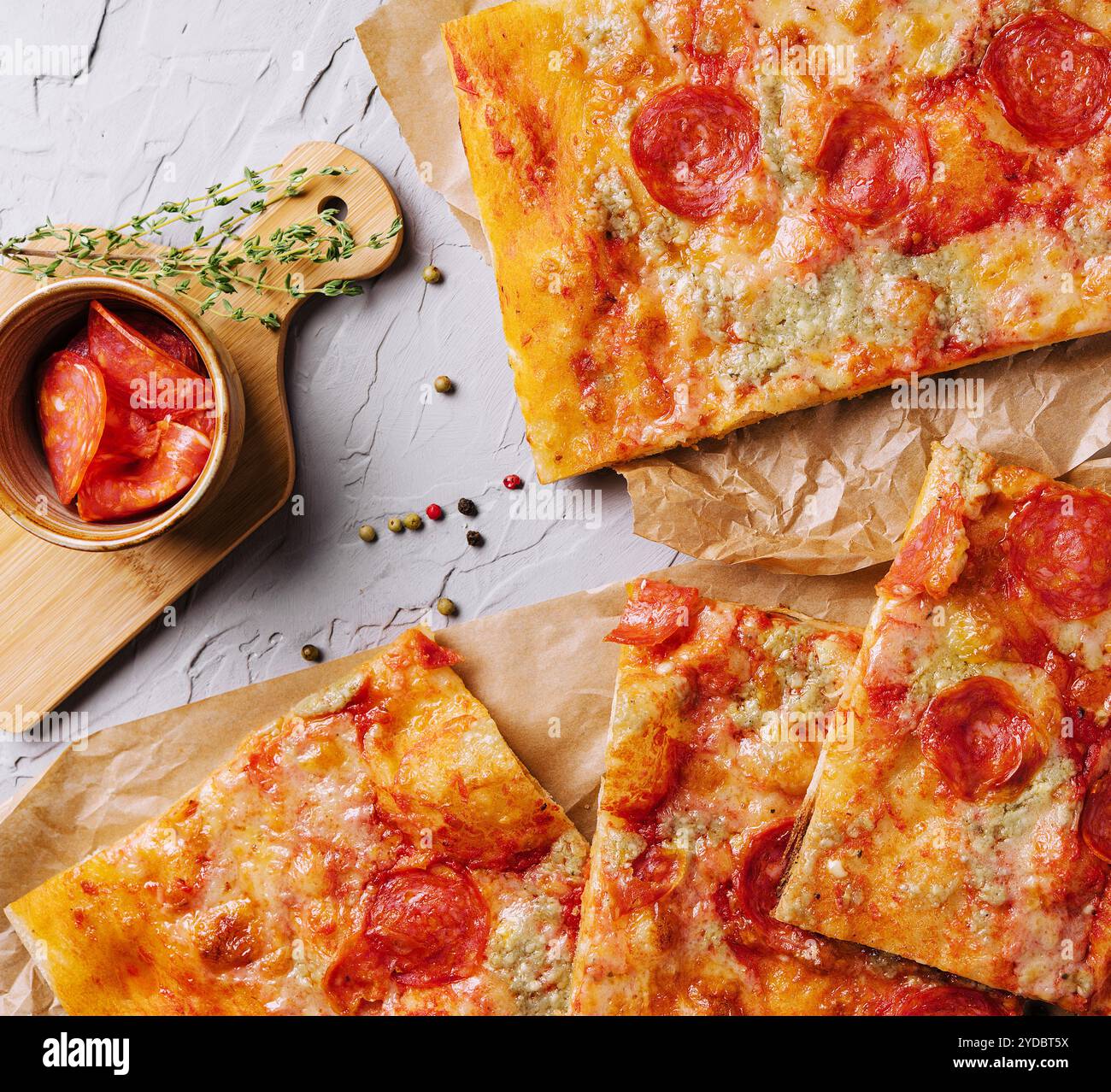 Long pizza napolitana with salami top view Stock Photo - Alamy