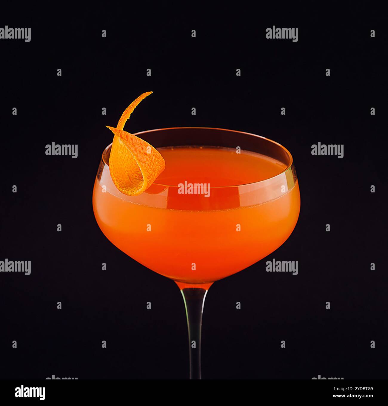 Fresh orange alcoholic drink with orange peel Stock Photo - Alamy
