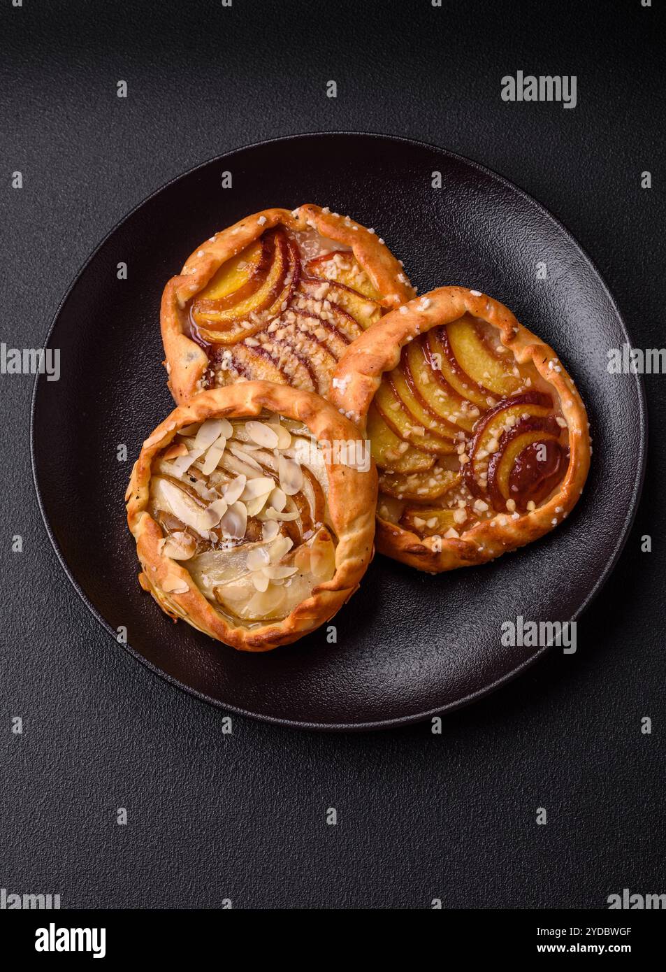 Delicious sweet crispy galettes with fruits and cinnamon Stock Photo ...