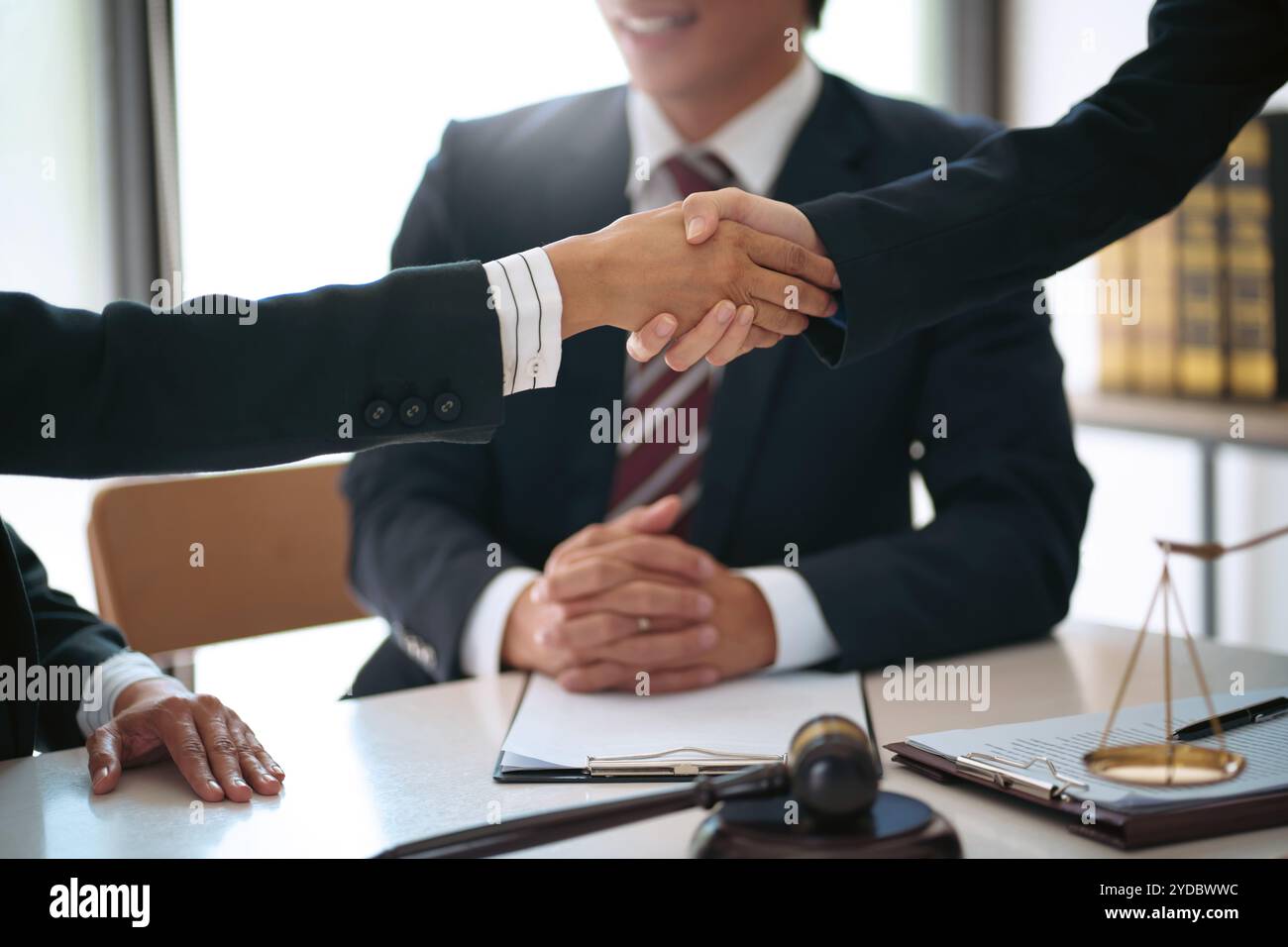 Lawyer consultant shaking hand with client sign contract agreement ...