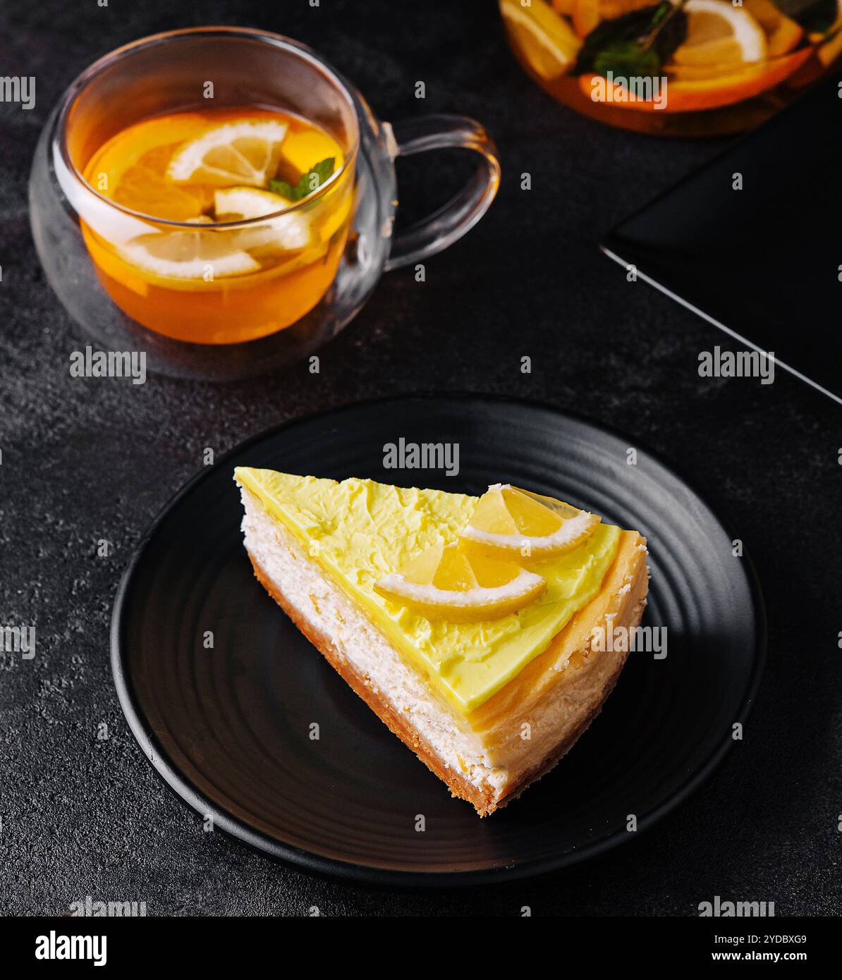 Lemon cheesecake with tea glass top view Stock Photo - Alamy