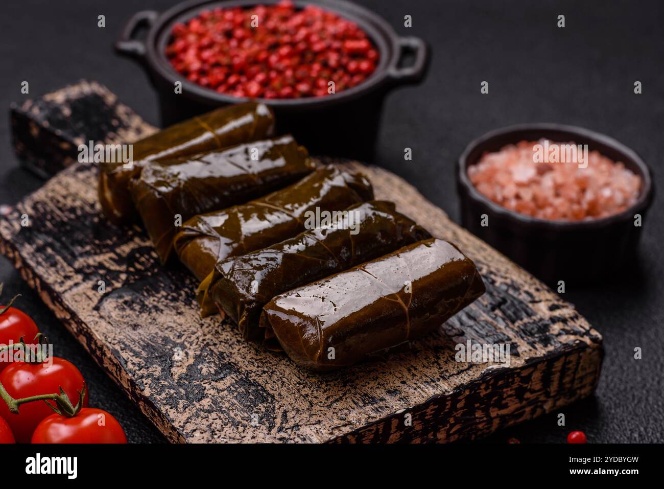Delicious dolma in the form of rice and meat wrapped in grape leaves ...