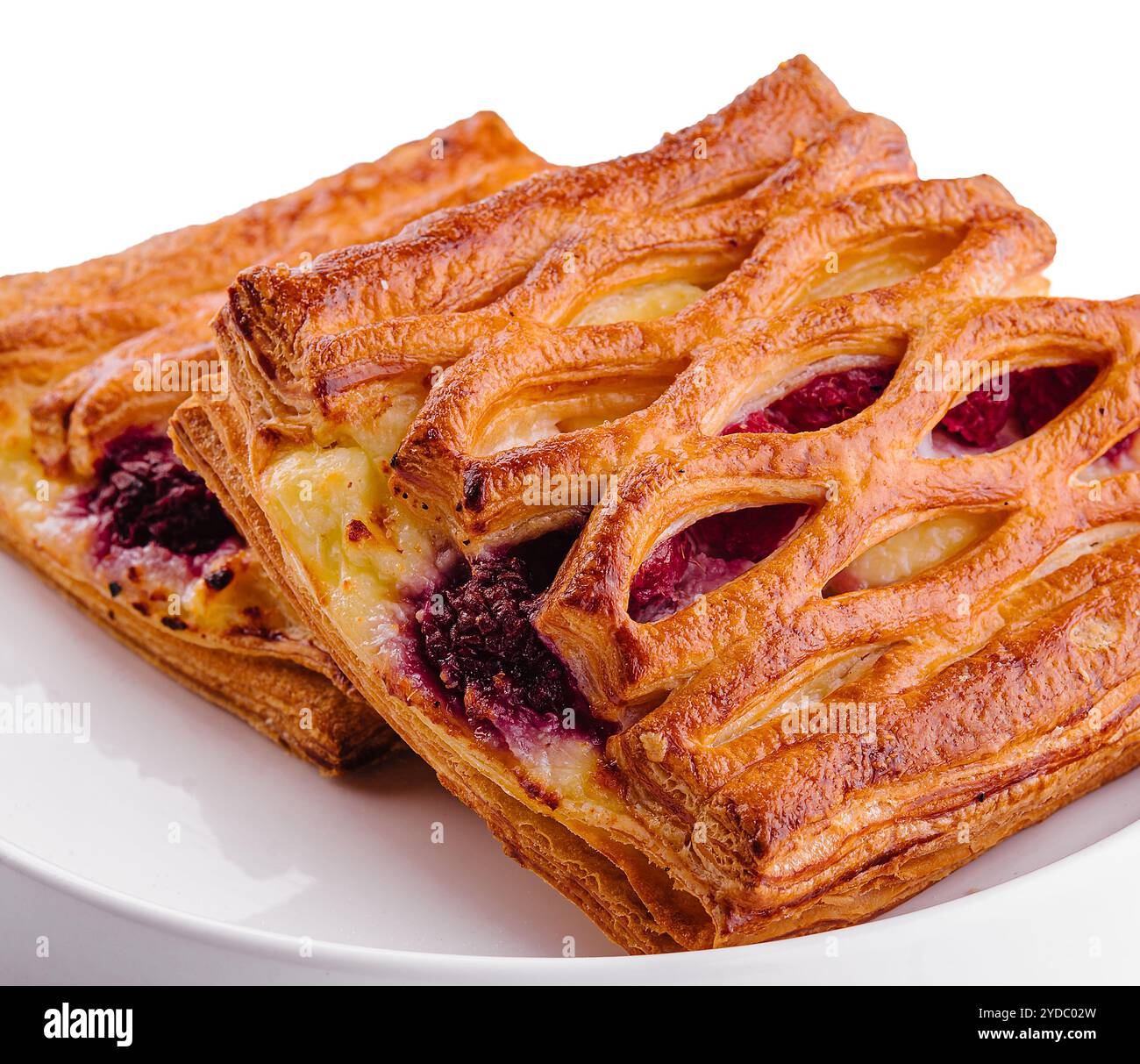 Delicious puff pastry with raspberry jam Stock Photo - Alamy
