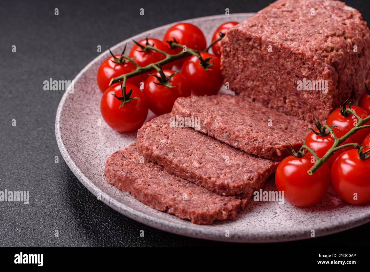 Delicious canned pink ham with salt, spices and herbs Stock Photo - Alamy