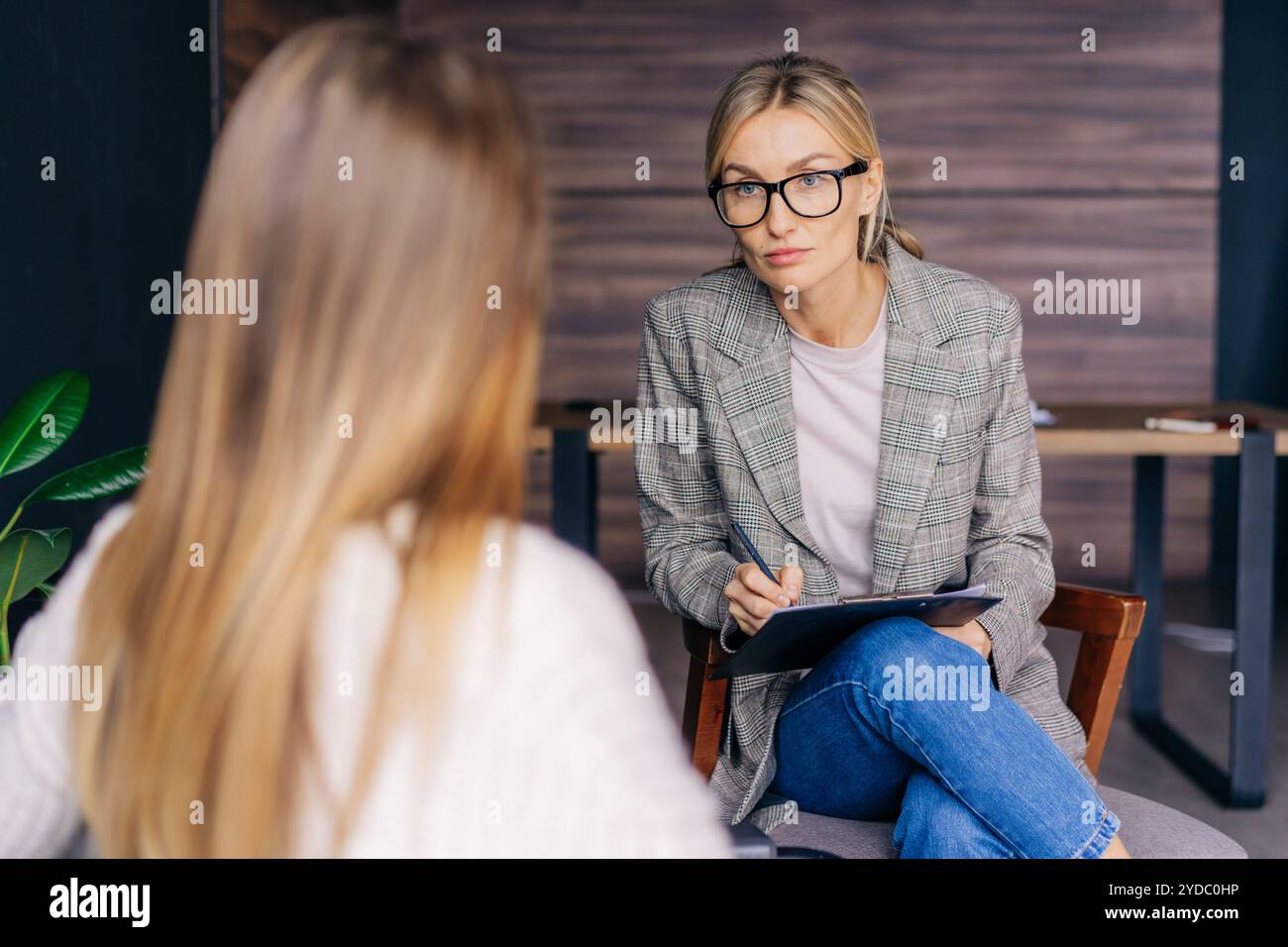Woman patient attentively listens hi-res stock photography and images ...