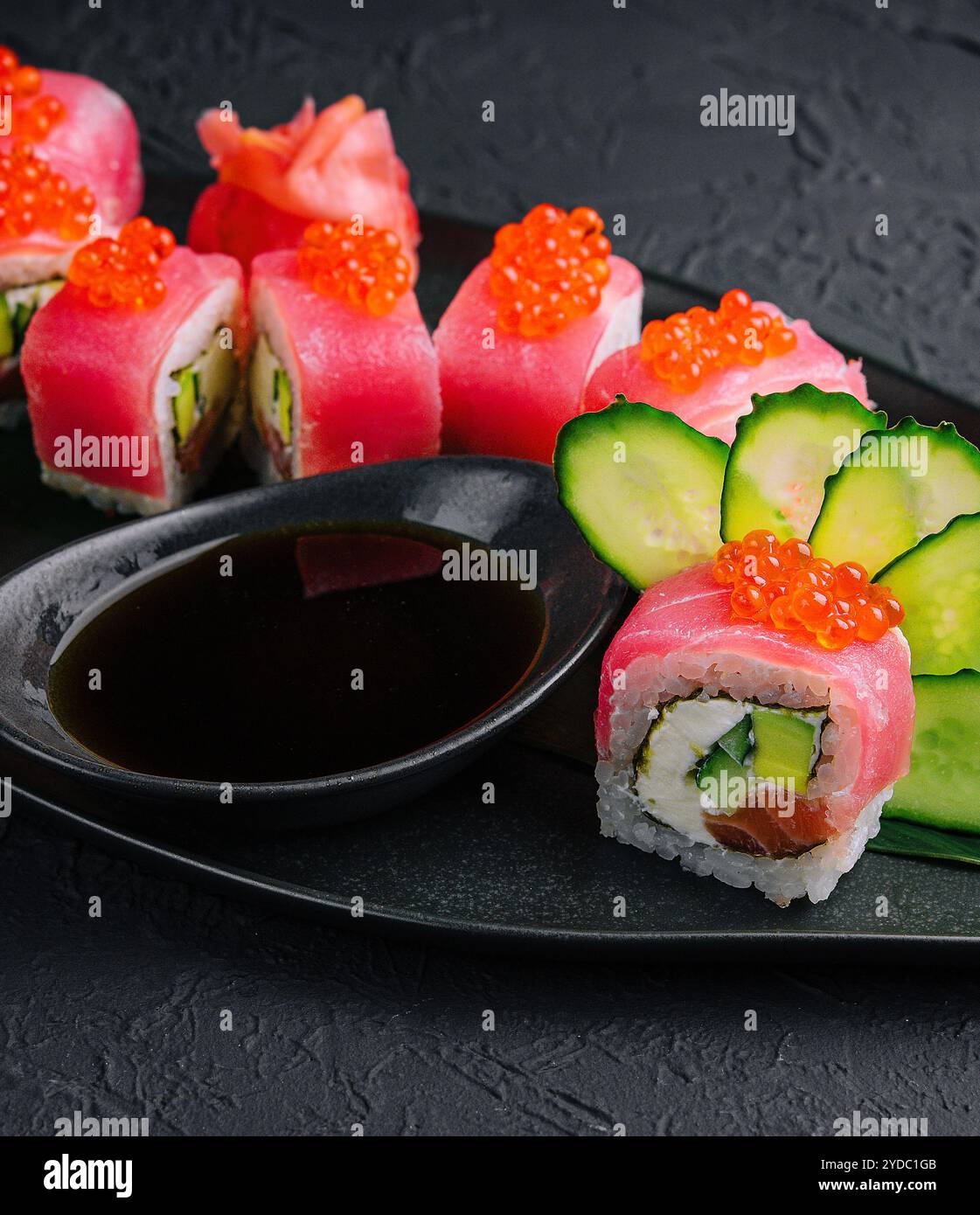 Red fish sushi roll hi-res stock photography and images - Alamy