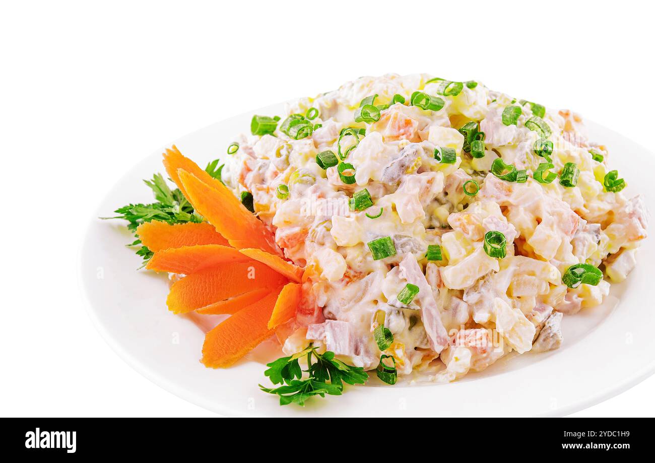 Olivier salad, isolated on white background Stock Photo - Alamy