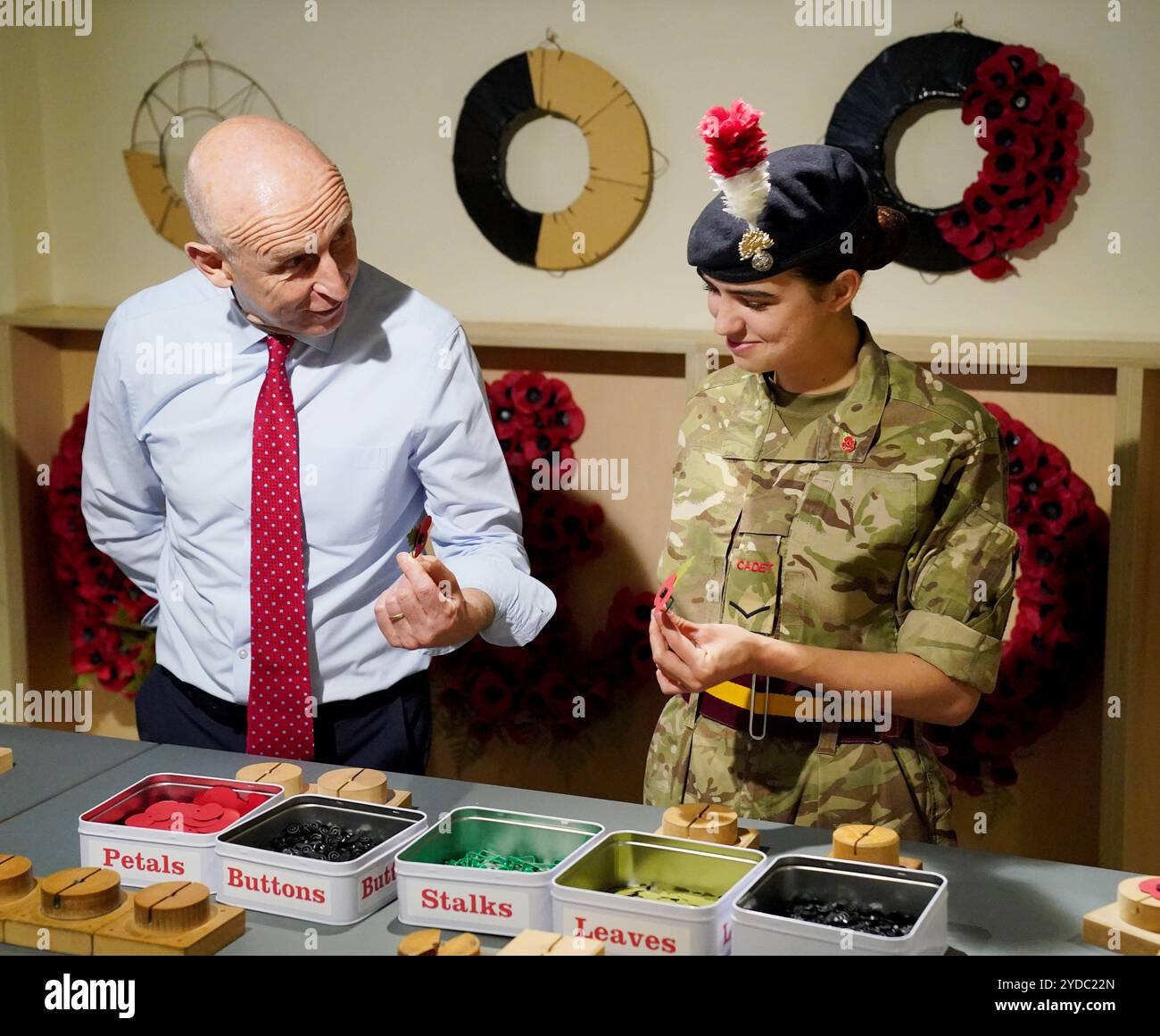 Defence Secretary John Healy makes poppies with cadet from 197 Feltham ...