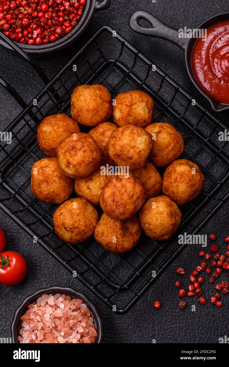 Delicious crispy balls breaded with mozzarella cheese, salt and spices ...