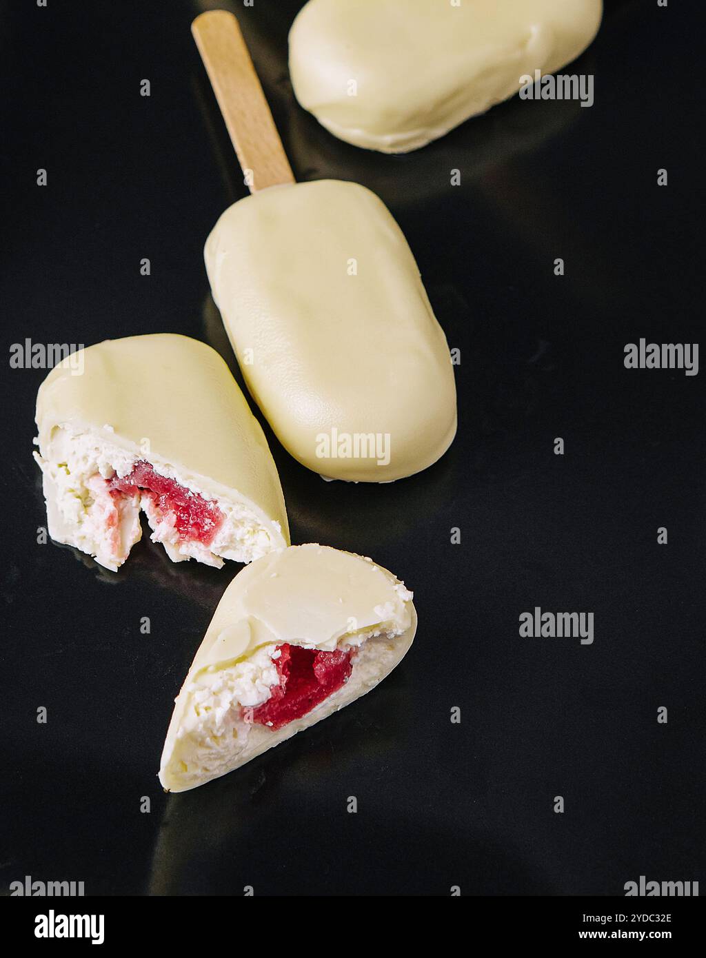 Dessert from ice cream lolly with white chocolate coating Stock Photo ...