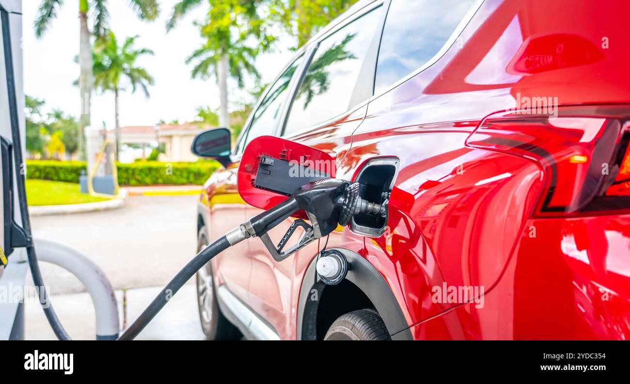 Car refueling on petrol station. Fuel pump with gasoline. Service is ...