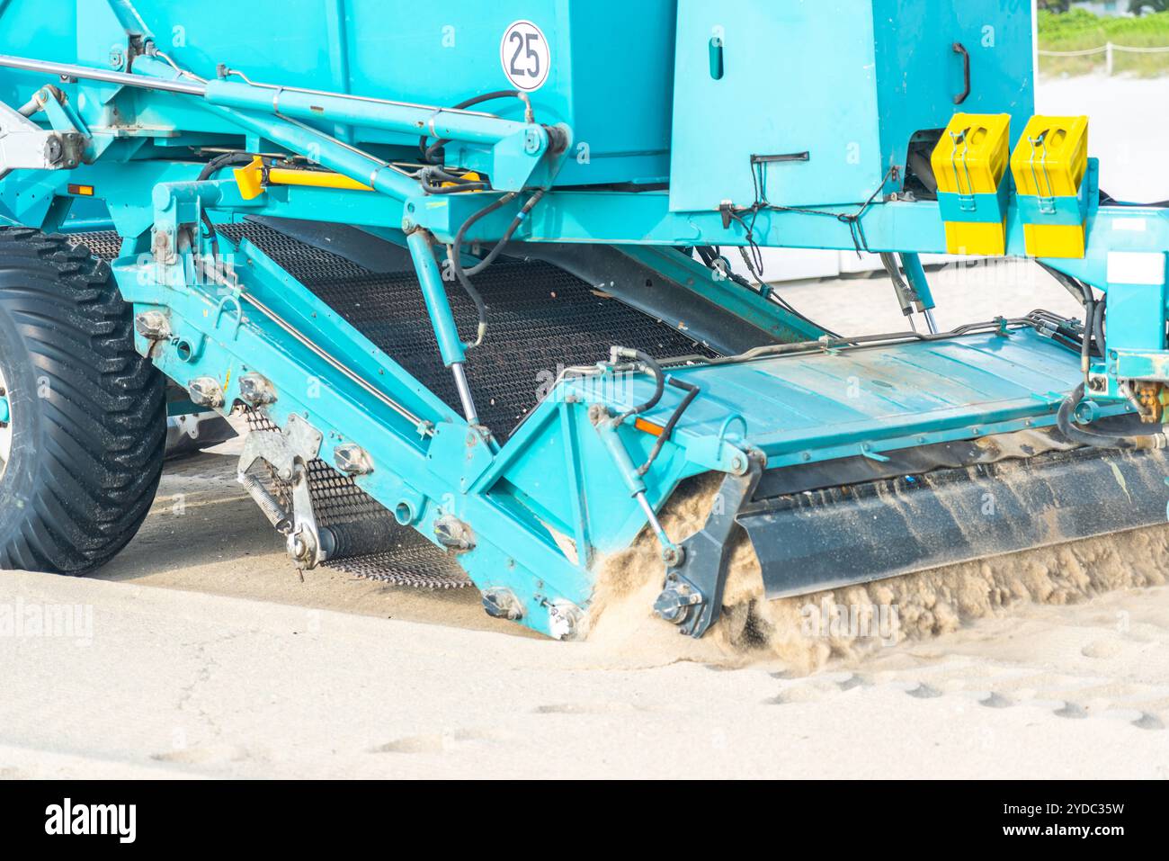 Tractor cleaning sand in South beach in Miami Stock Photo - Alamy