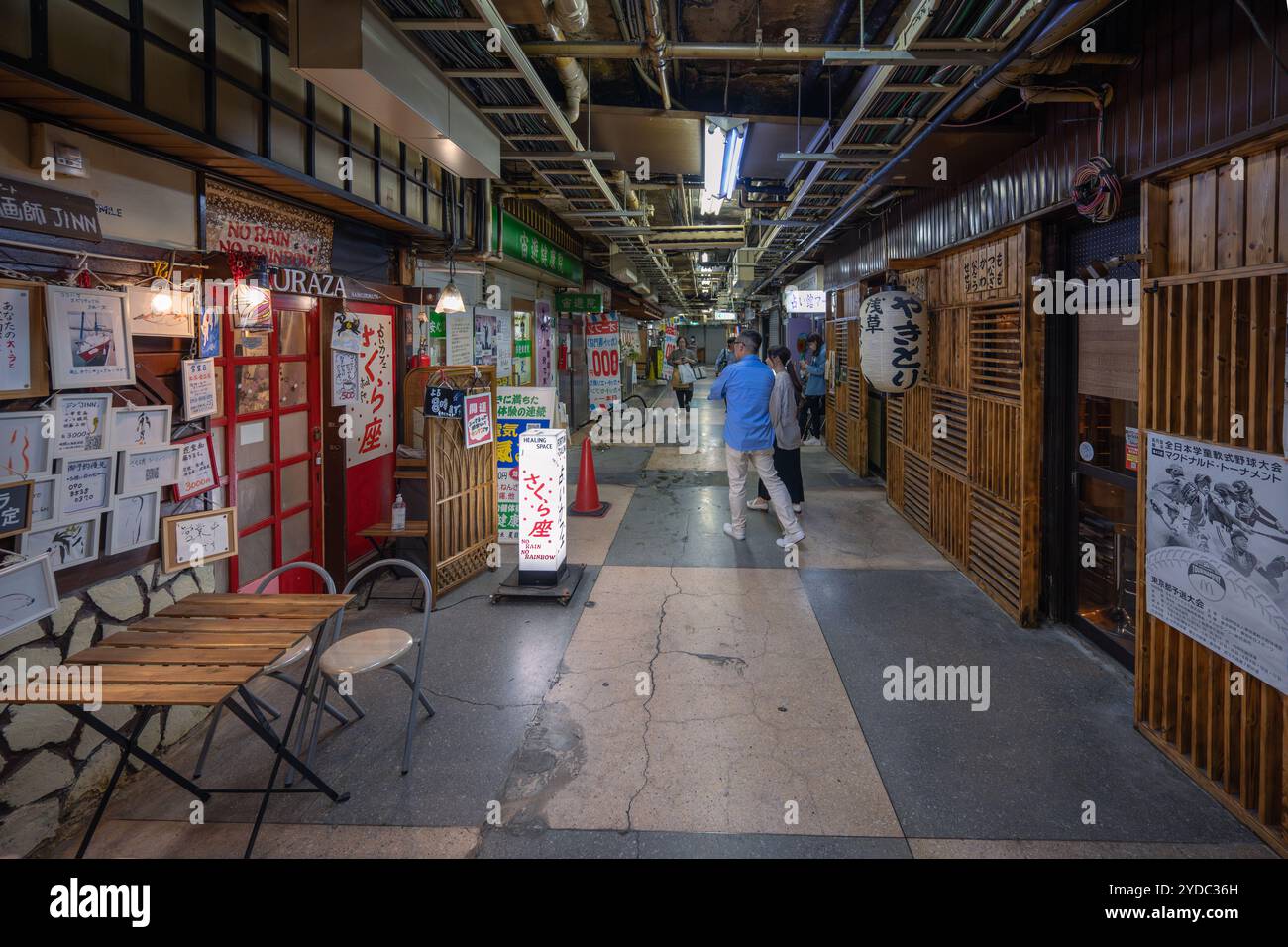 This is an underground mall leading to the Tokyo subway system, these ...