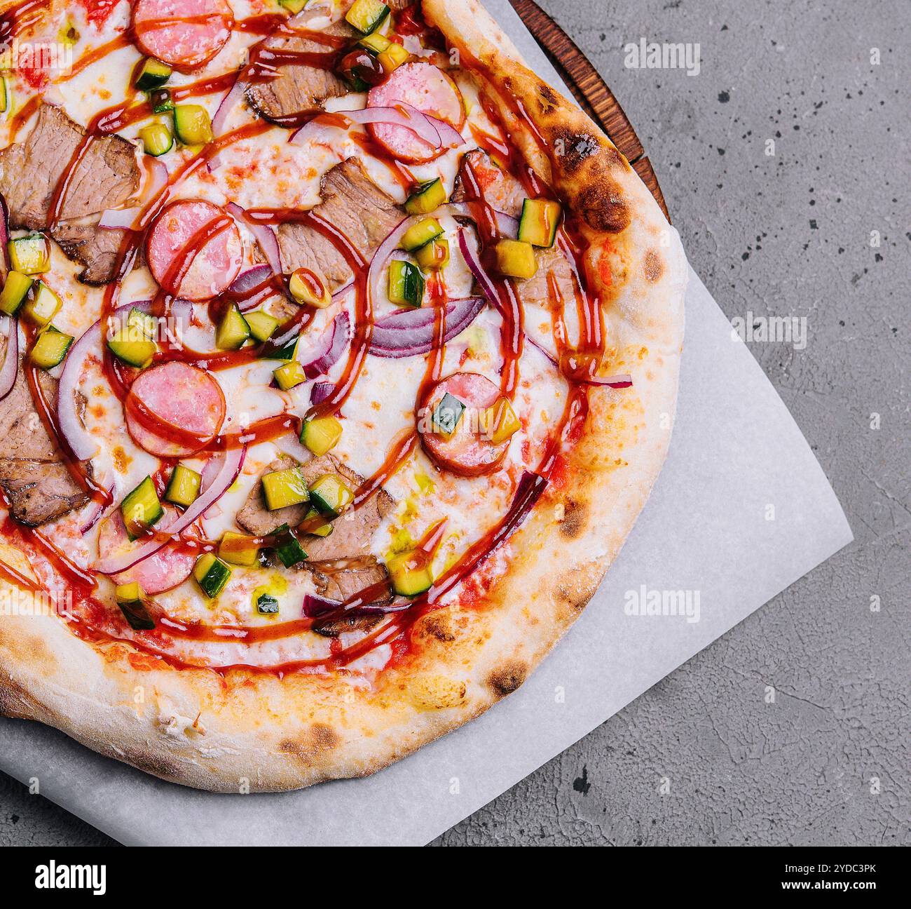 Barbecue pizza with cheese and tomato sauces Stock Photo - Alamy