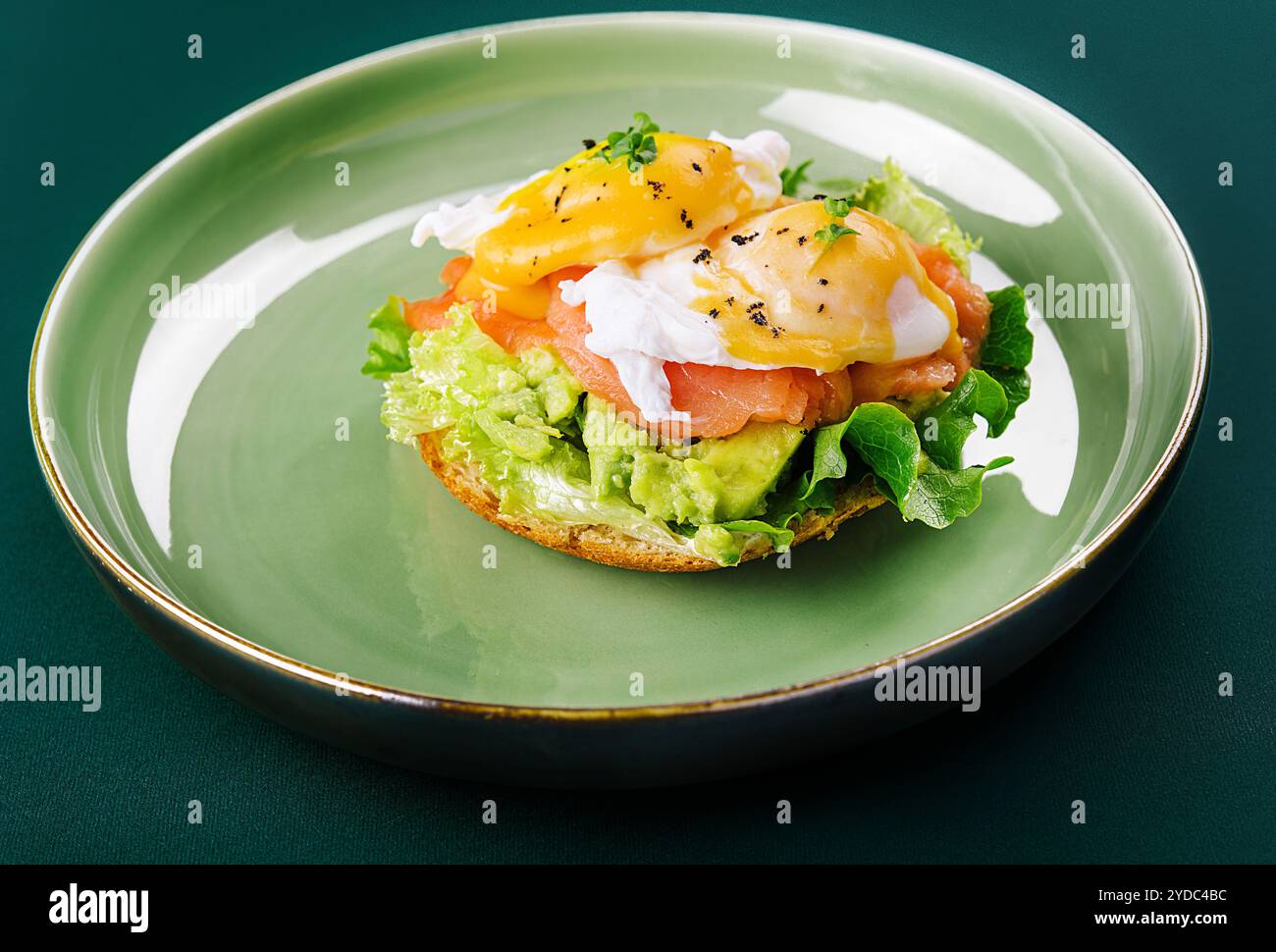 Wholemeal Bread Toast, smashed Avocado, Salmon and Egg Stock Photo - Alamy