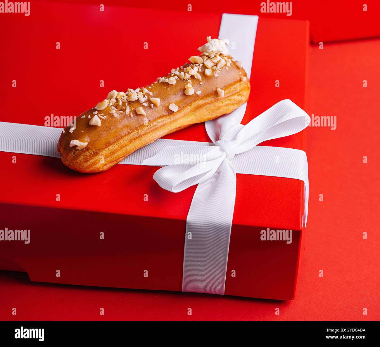Christmas gifts presents with French eclair Stock Photo - Alamy