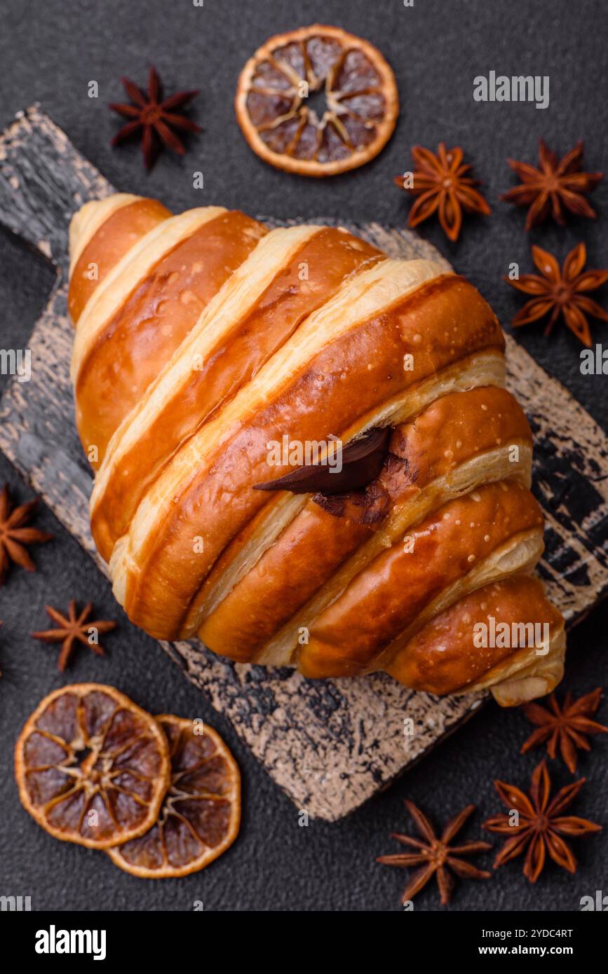 Delicious crispy sweet croissant cornet with chocolate Stock Photo - Alamy