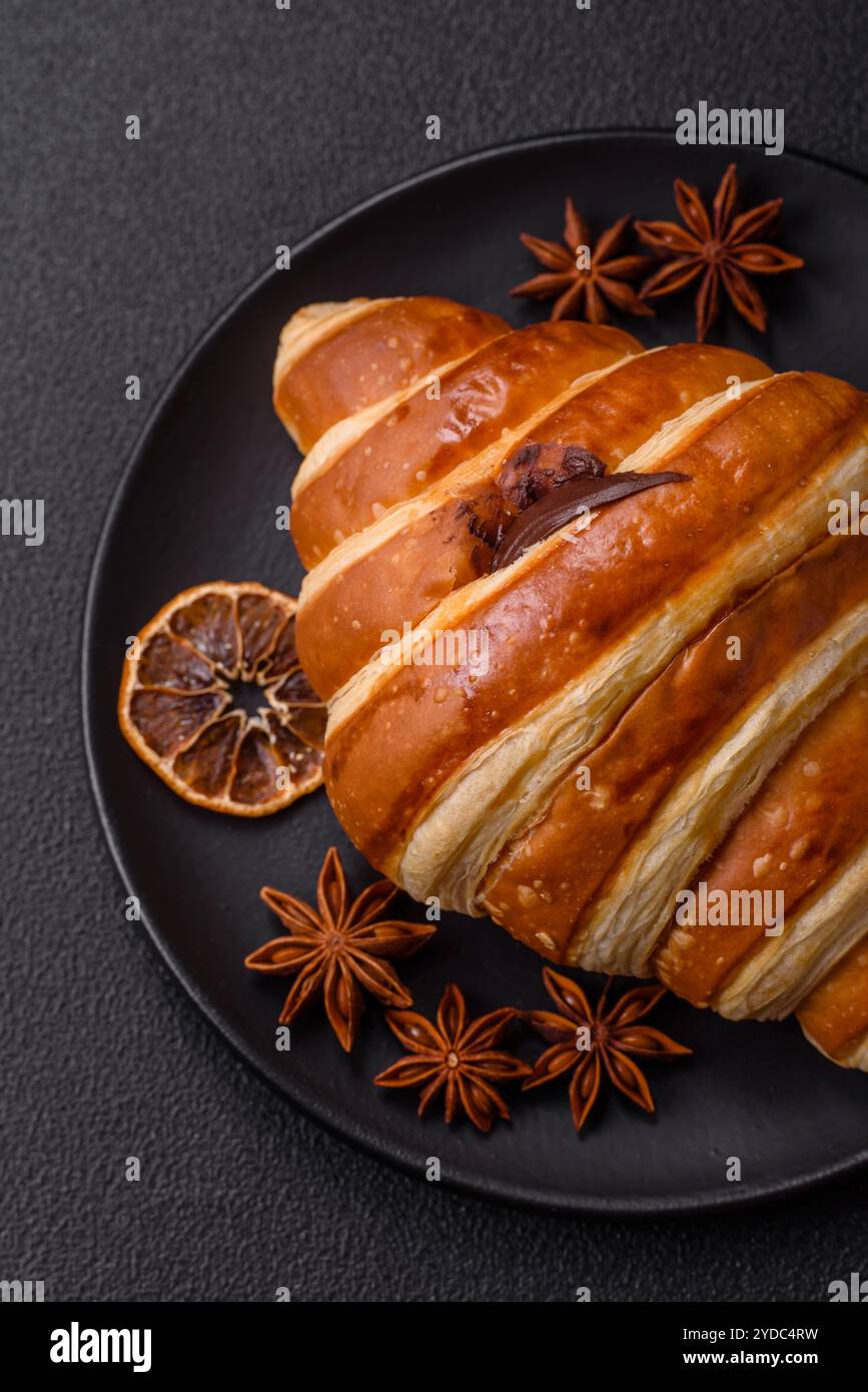 Delicious crispy sweet croissant cornet with chocolate Stock Photo - Alamy