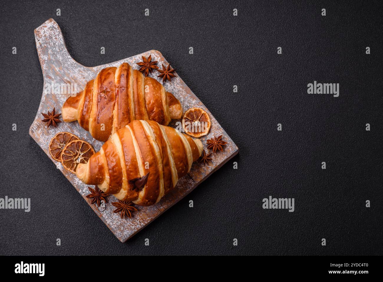 Delicious crispy sweet croissant cornet with chocolate Stock Photo - Alamy