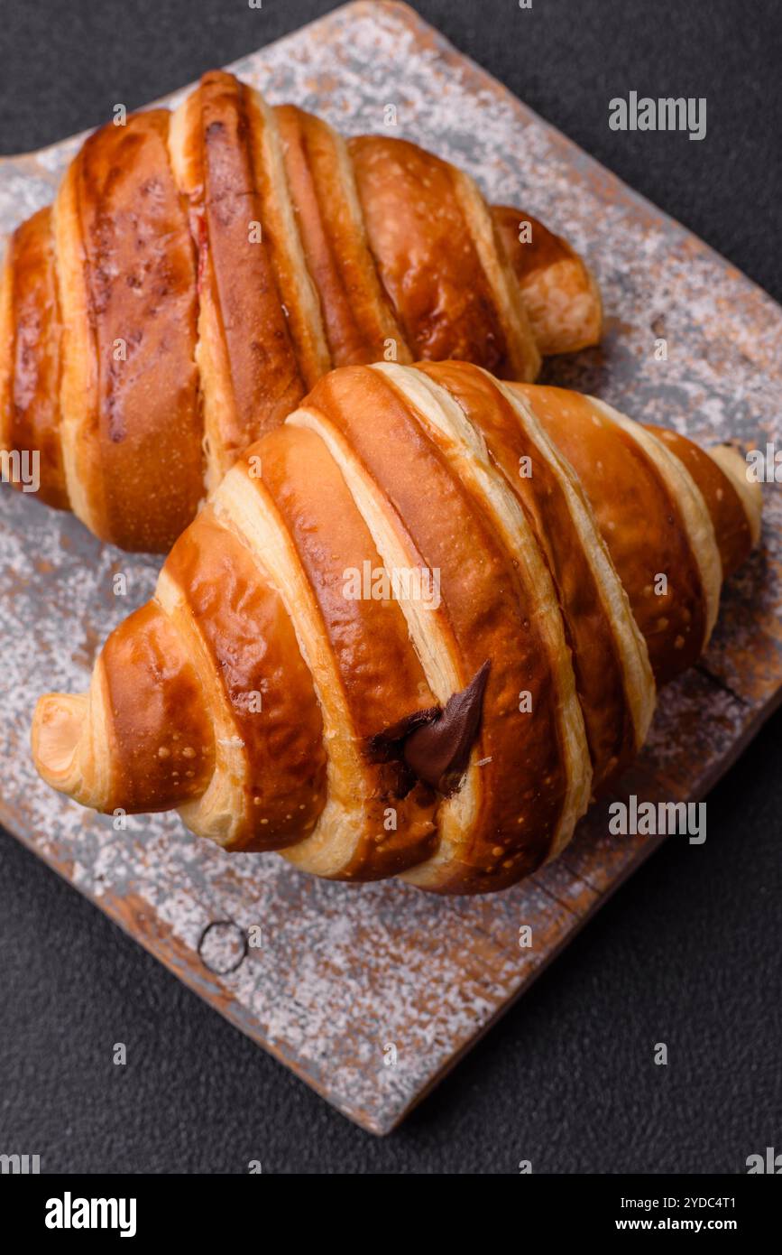 Delicious crispy sweet croissant cornet with chocolate Stock Photo - Alamy