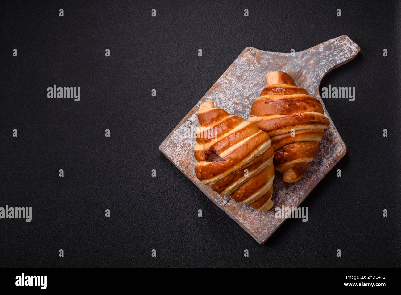 Delicious crispy sweet croissant cornet with chocolate Stock Photo - Alamy