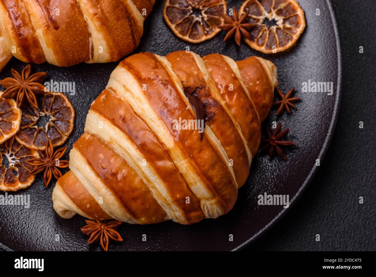 Delicious crispy sweet croissant cornet with chocolate Stock Photo - Alamy
