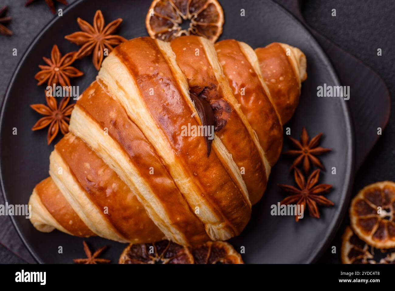 Delicious crispy sweet croissant cornet with chocolate Stock Photo - Alamy