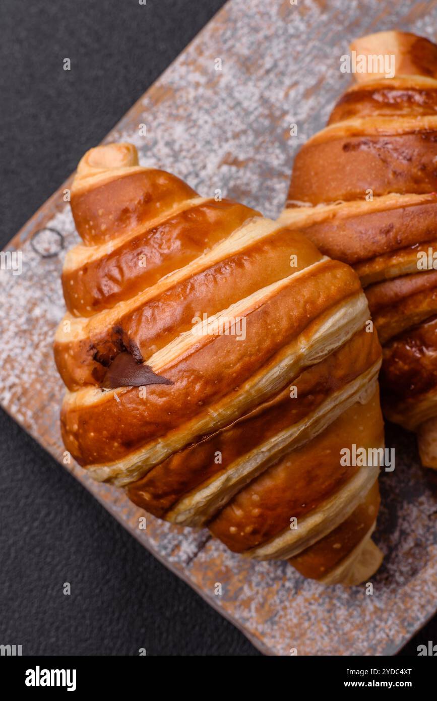 Delicious crispy sweet croissant cornet with chocolate Stock Photo - Alamy