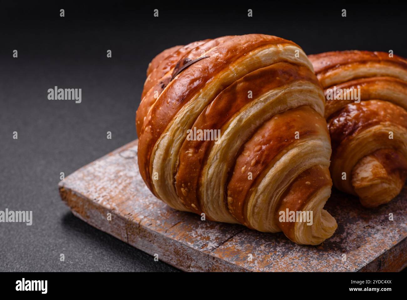 Delicious crispy sweet croissant cornet with chocolate Stock Photo - Alamy