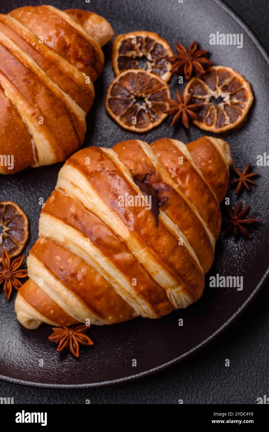 Delicious crispy sweet croissant cornet with chocolate Stock Photo - Alamy