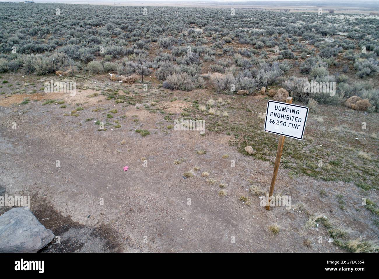 Remote Desert Landscape with Dumping Prohibited Sign Stock Photo - Alamy
