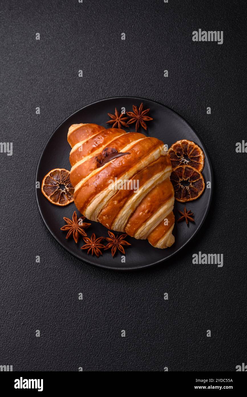 Delicious crispy sweet croissant cornet with chocolate Stock Photo - Alamy