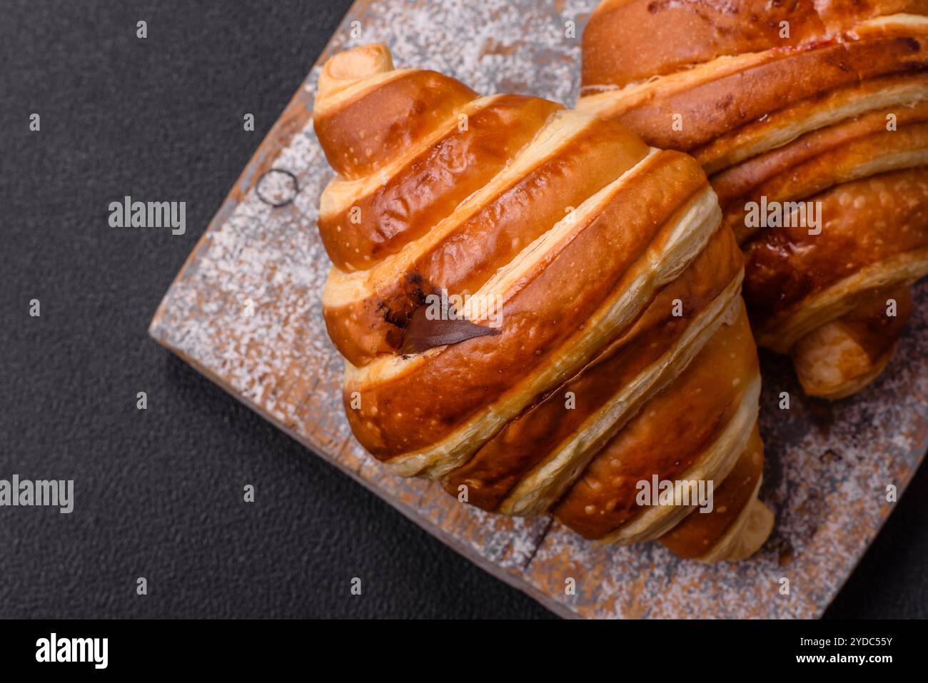 Delicious crispy sweet croissant cornet with chocolate Stock Photo - Alamy