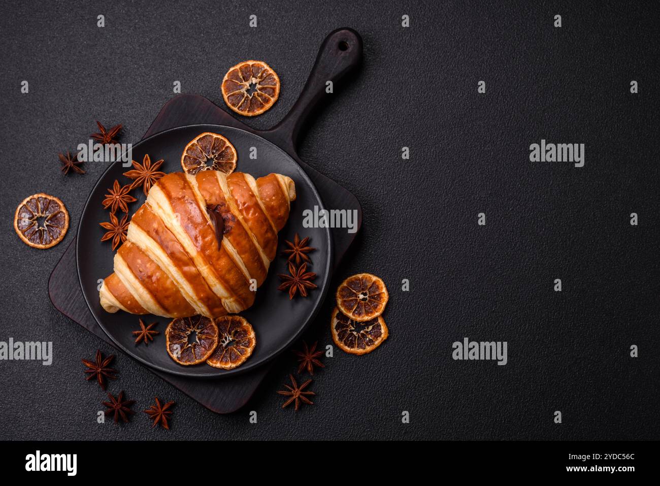 Delicious crispy sweet croissant cornet with chocolate Stock Photo - Alamy